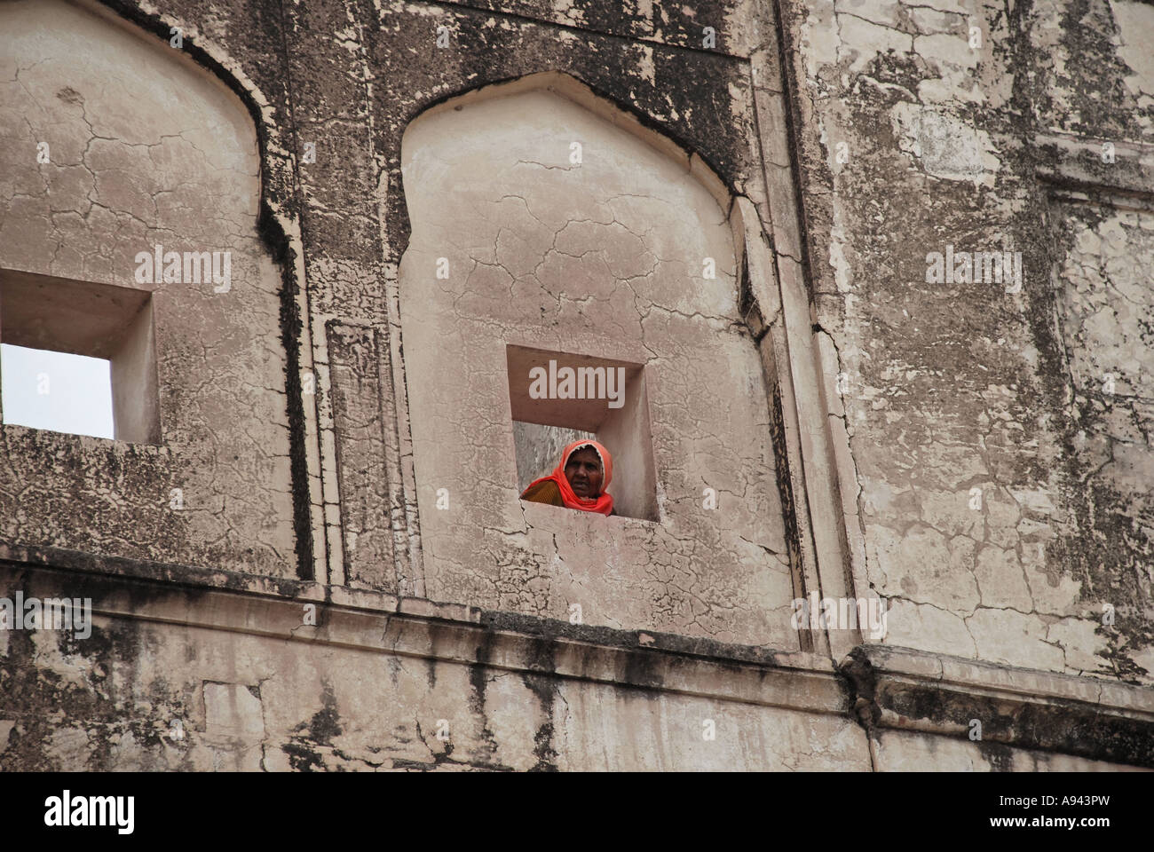 Local indian lady in window Stock Photo - Alamy