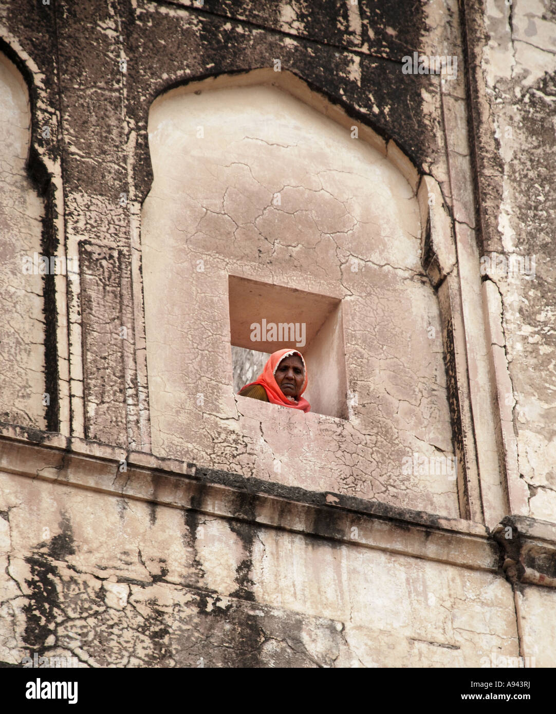 Local indian lady in window Stock Photo - Alamy
