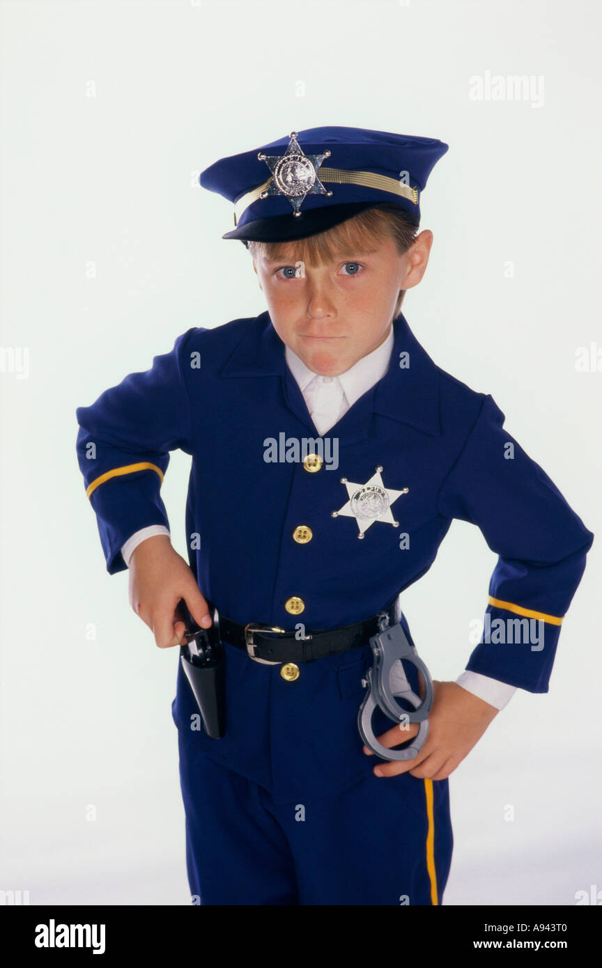 Portrait of a boy dressed as a policeman Stock Photo - Alamy