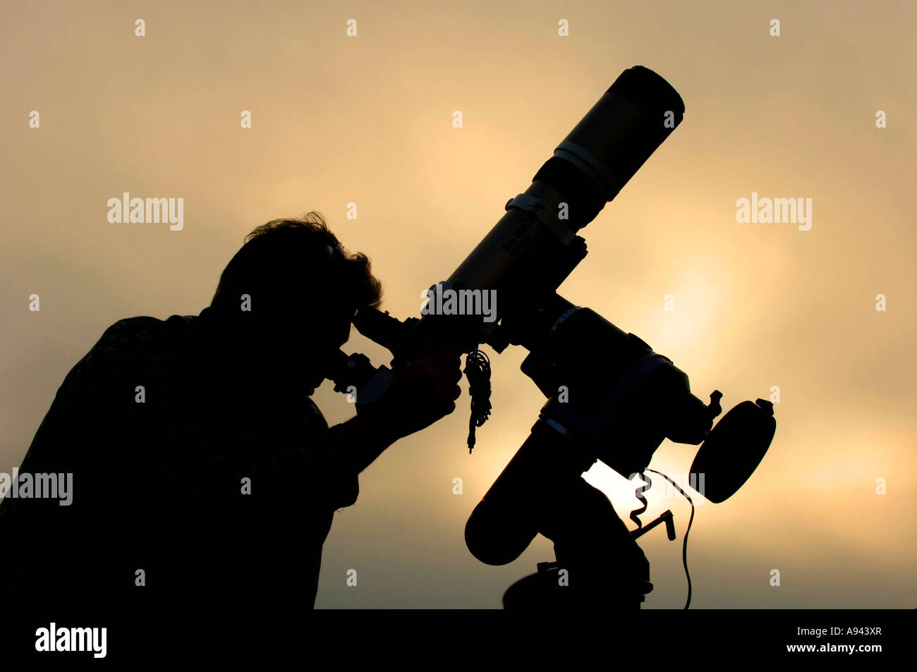Astronomer at night Stock Photo - Alamy