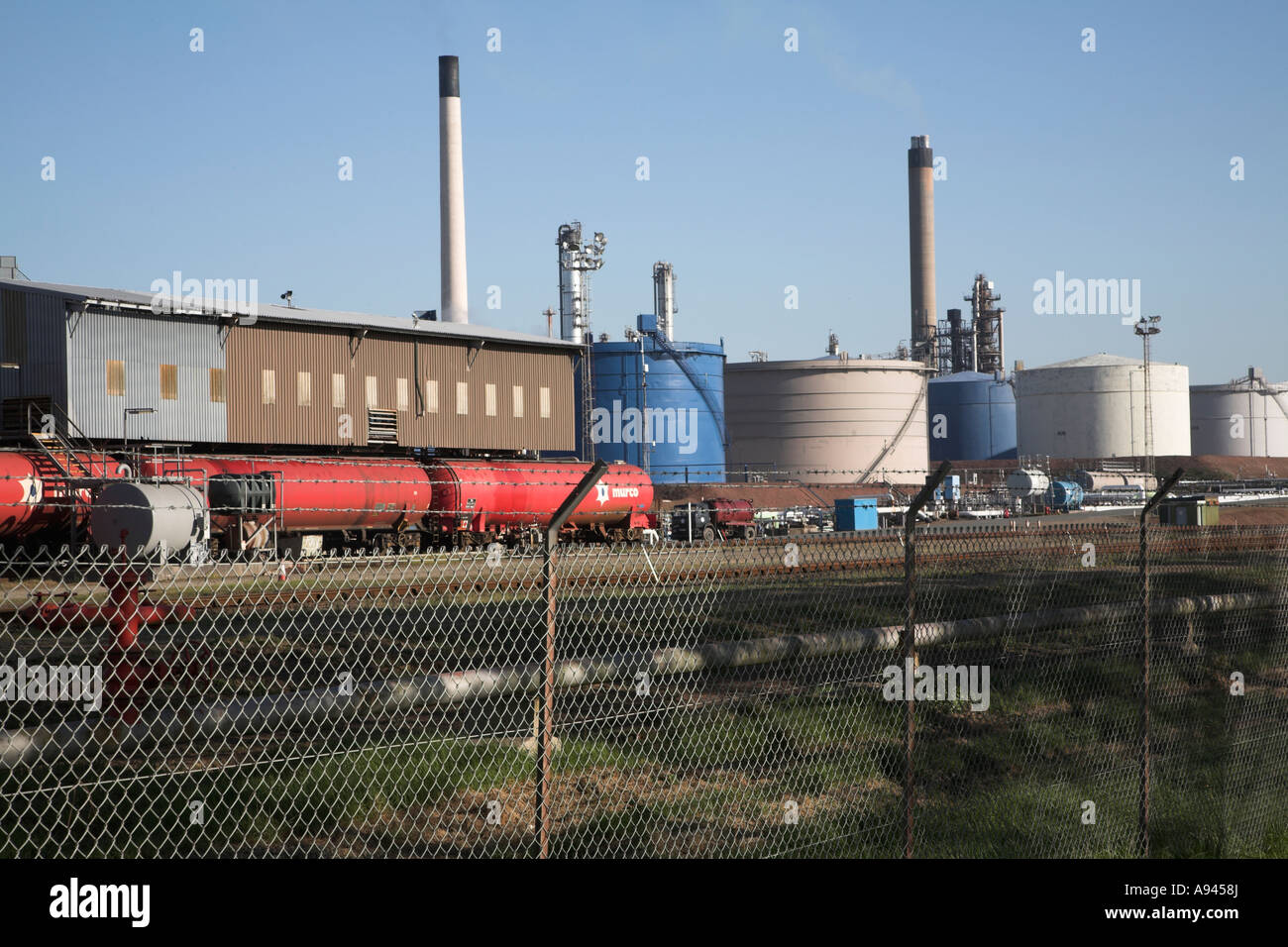 Railway line storage tanks chimneys Amoco Oil Refinery, Robeston ...