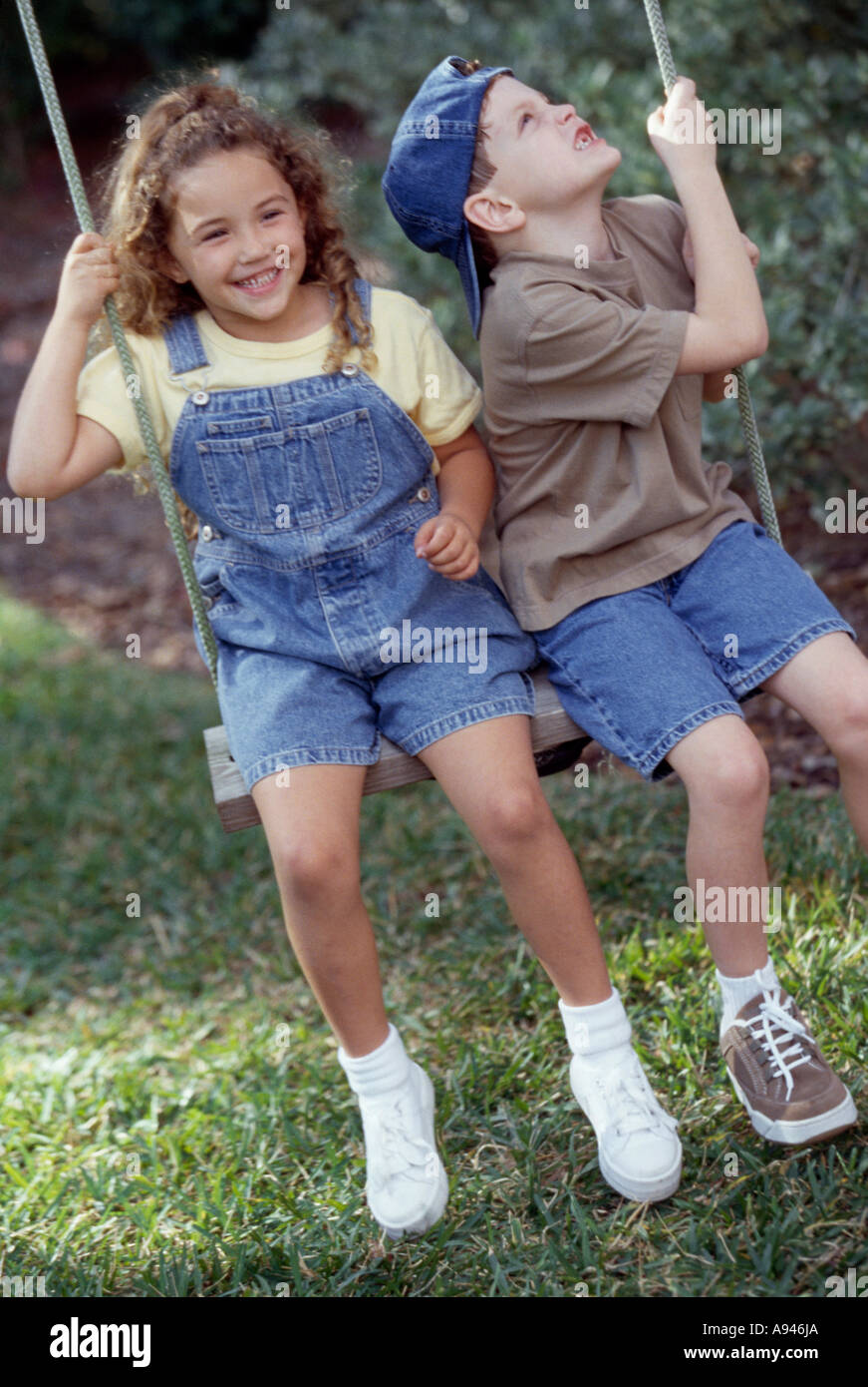 Boy girl play on rope hi-res stock photography and images - Alamy