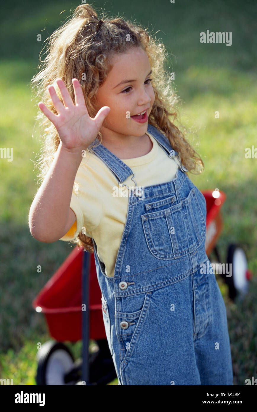 Close-up of a girl waving Stock Photo - Alamy