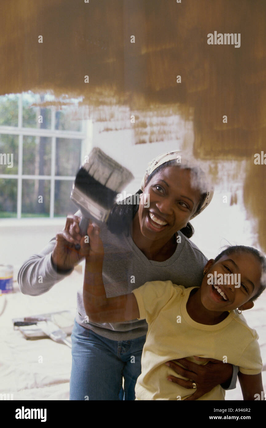 Mother teaching her daughter to paint Stock Photo - Alamy Mother teaching her daughter to paint Stock Photo - Alamy