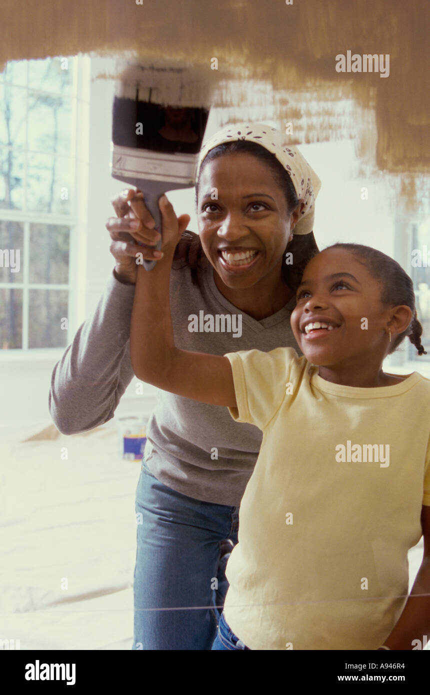 Mother teaching her daughter to paint Stock Photo - Alamy Mother teaching her daughter to paint Stock Photo - Alamy