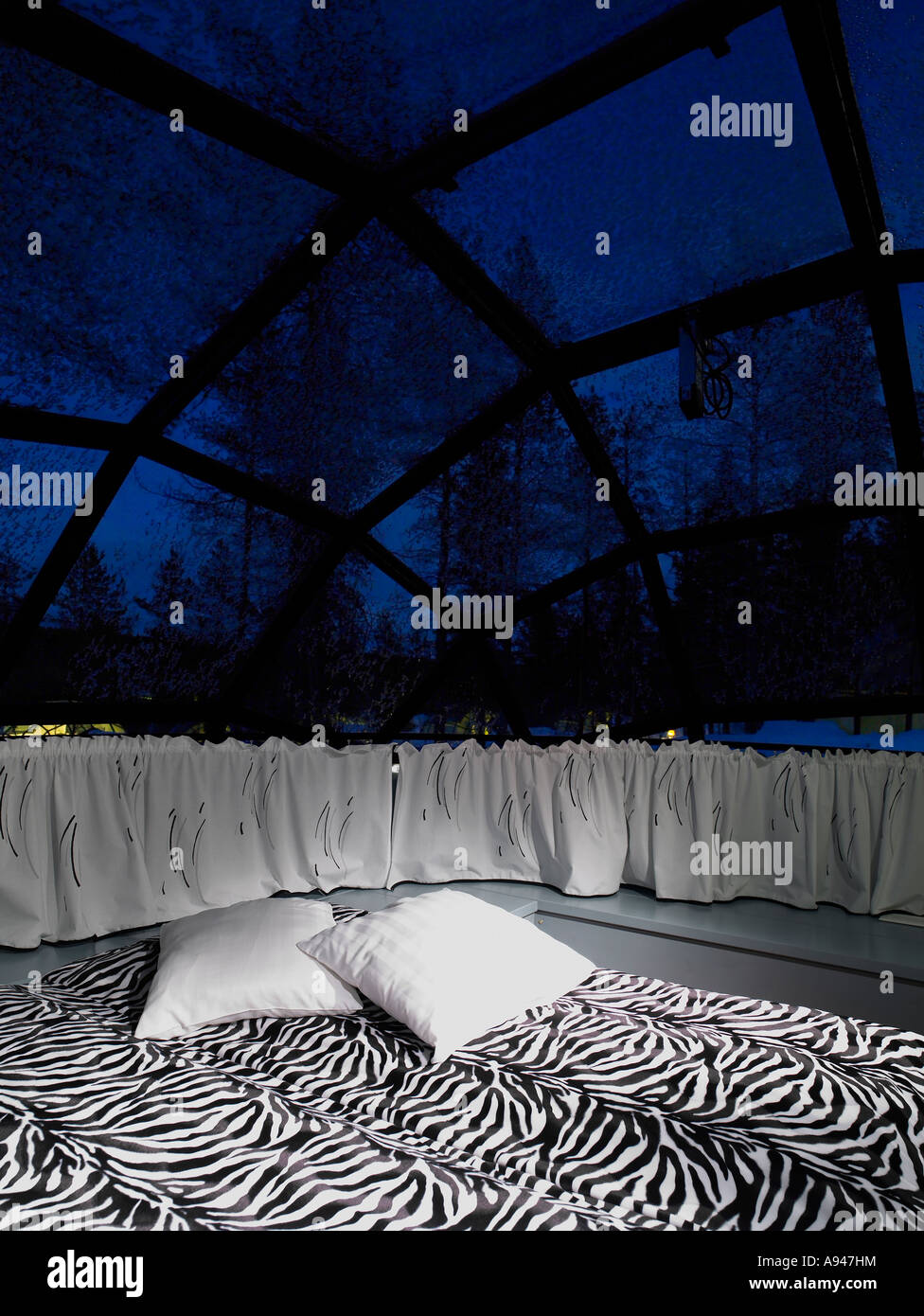 Bed in glass Igloo, Hotel and Igloo Village, Kakslauttanen, located in ...