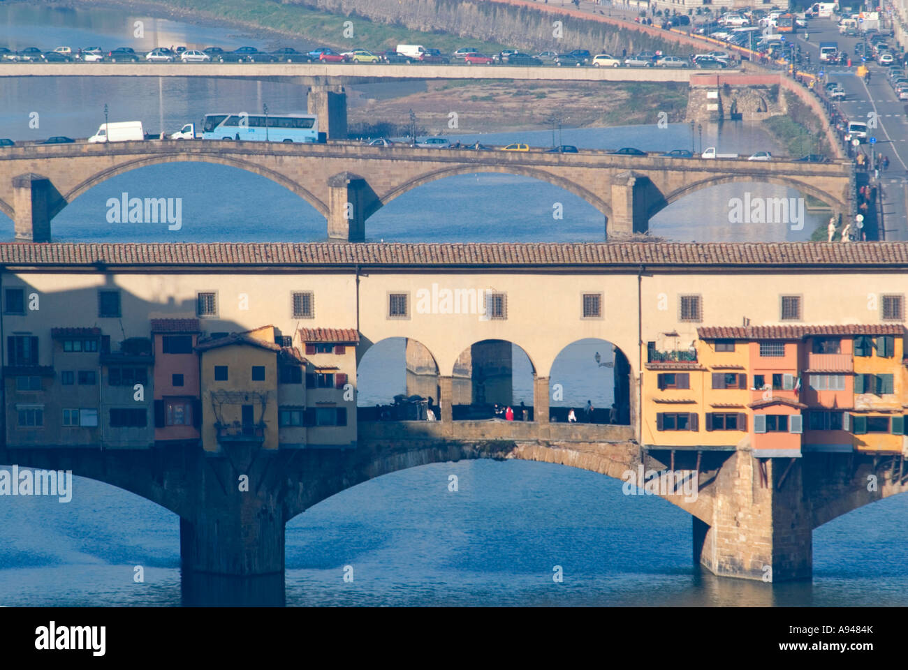 Horizontal aerial view across the roofs of Florence to the Ponte ...