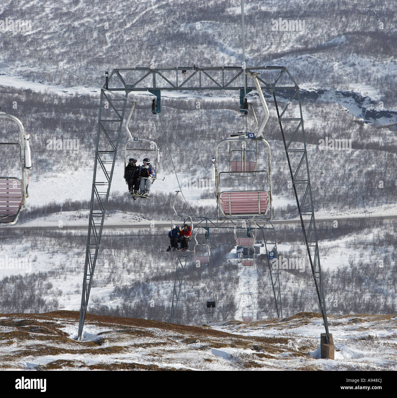Ski lift on resort skiers hi-res stock photography and images - Alamy