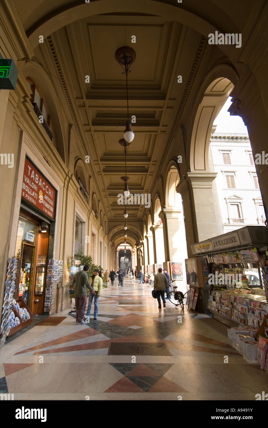 Vertical perspective view of the long covered colonnade underneath the ...