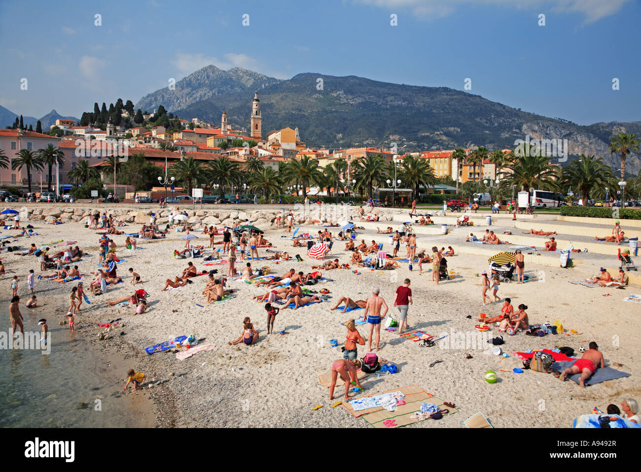 The beach and old town beyond at Menton Stock Photo - Alamy