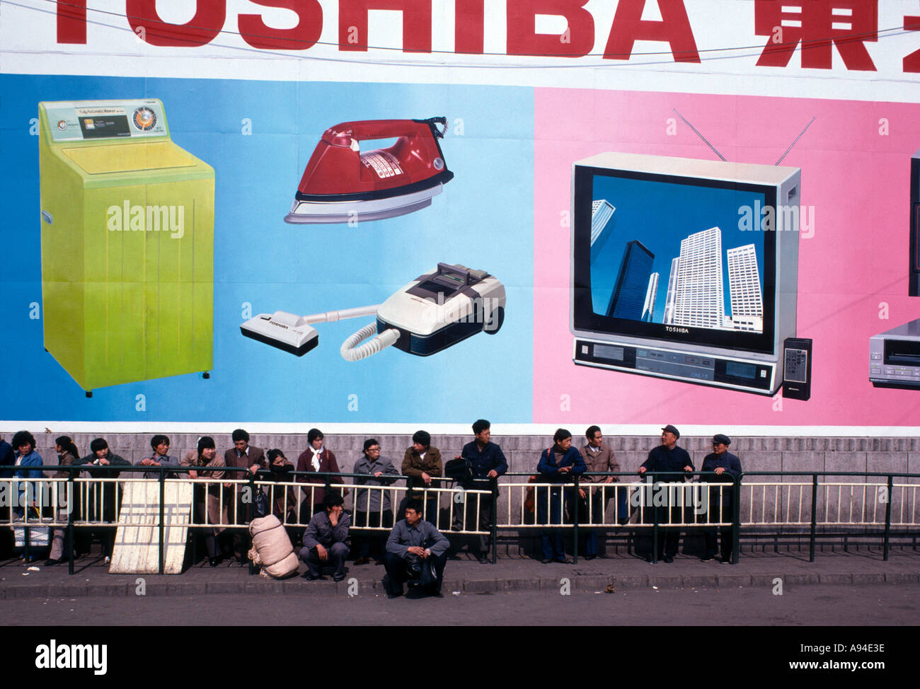 People waiting for buses in a bus stop Stock Photo - Alamy