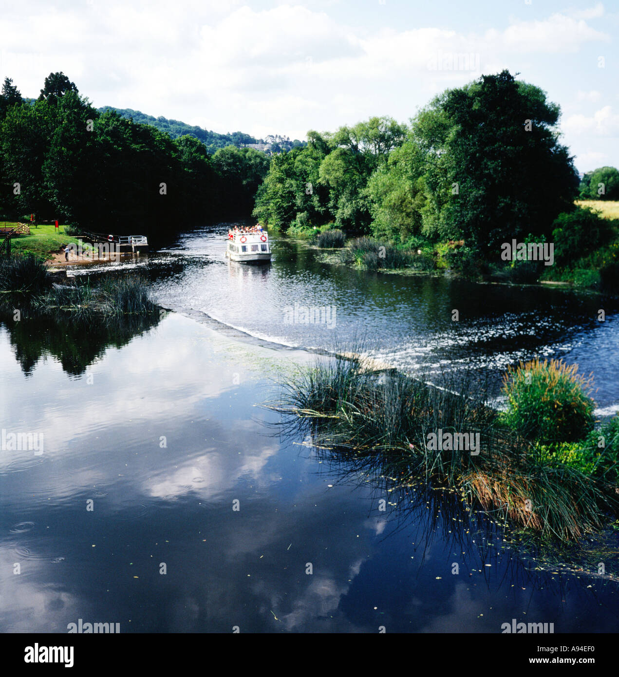 River cruise reaching the weir at Bathampton River Avon near Bath ...
