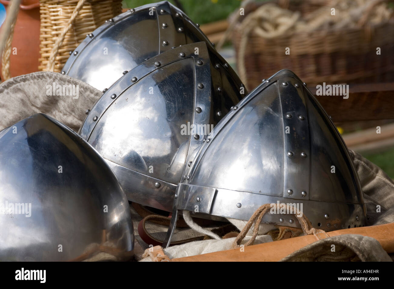 Close up of Replica medieval helmets metal England UK United Kingdom GB ...