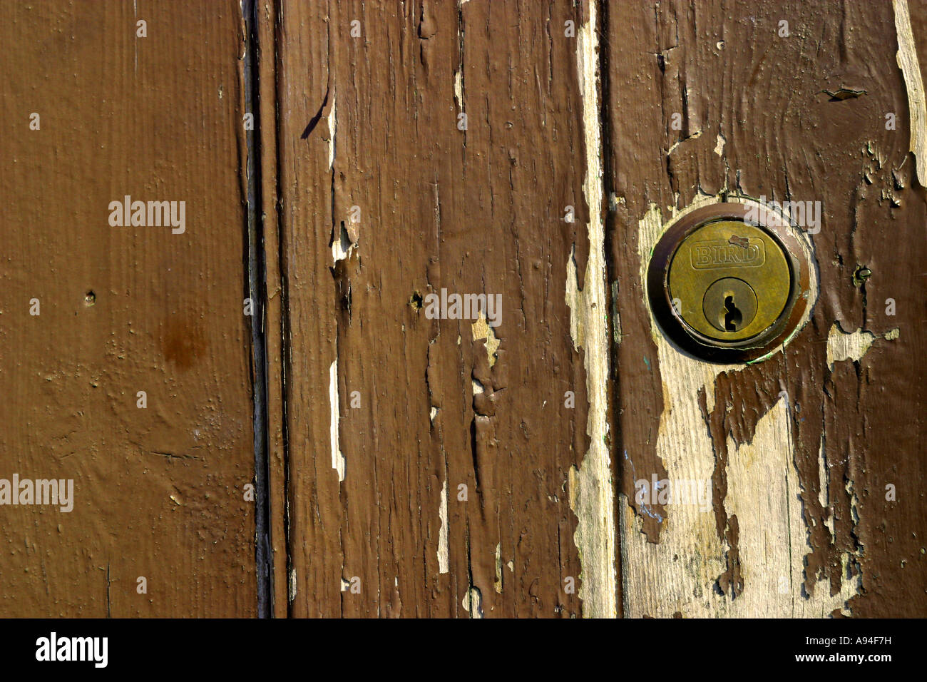 Old Wooden door with a key lock Stock Photo - Alamy