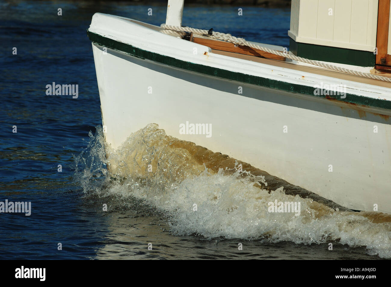 bow of small boat moving thorough water Stock Photo - Alamy