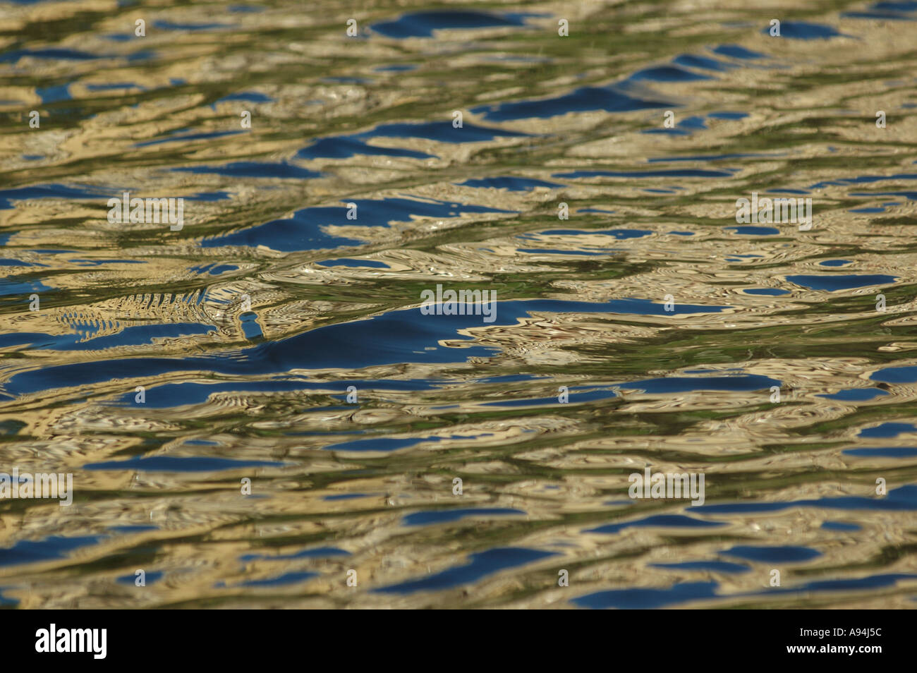 blue gold sheen on water dsca 3802 Stock Photo - Alamy