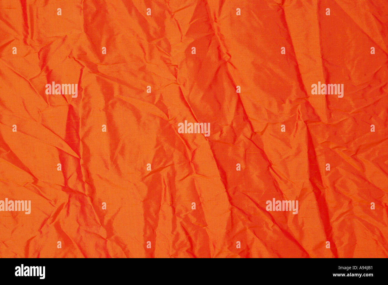 Orange silk fabric hi-res stock photography and images - Alamy