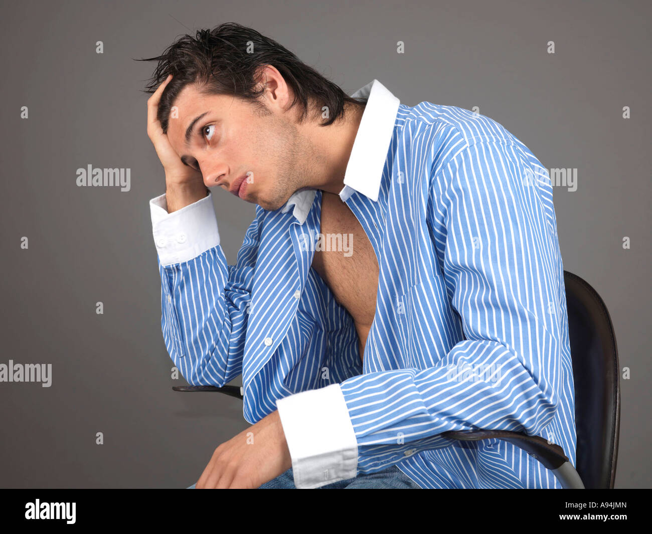 Stressed Young Man with Headache Model Released Stock Photo - Alamy
