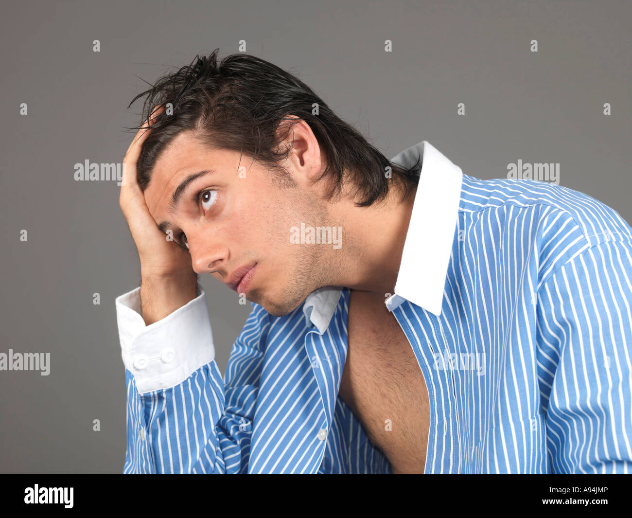 Stressed Young Man with Headache Model Released Stock Photo - Alamy