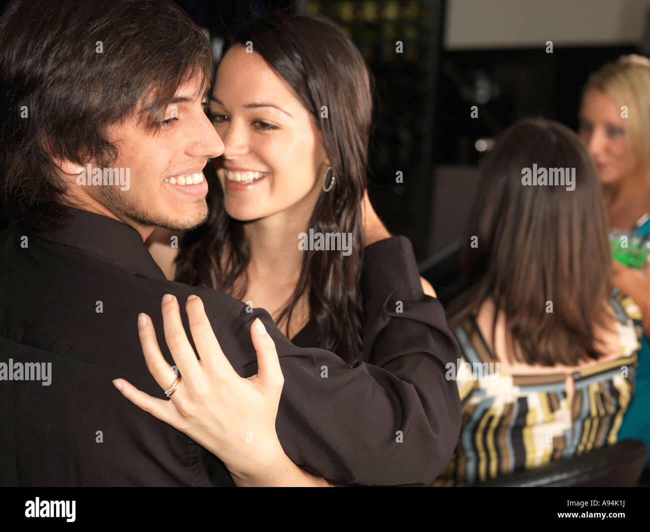 Couple in Bar Model Released Stock Photo - Alamy