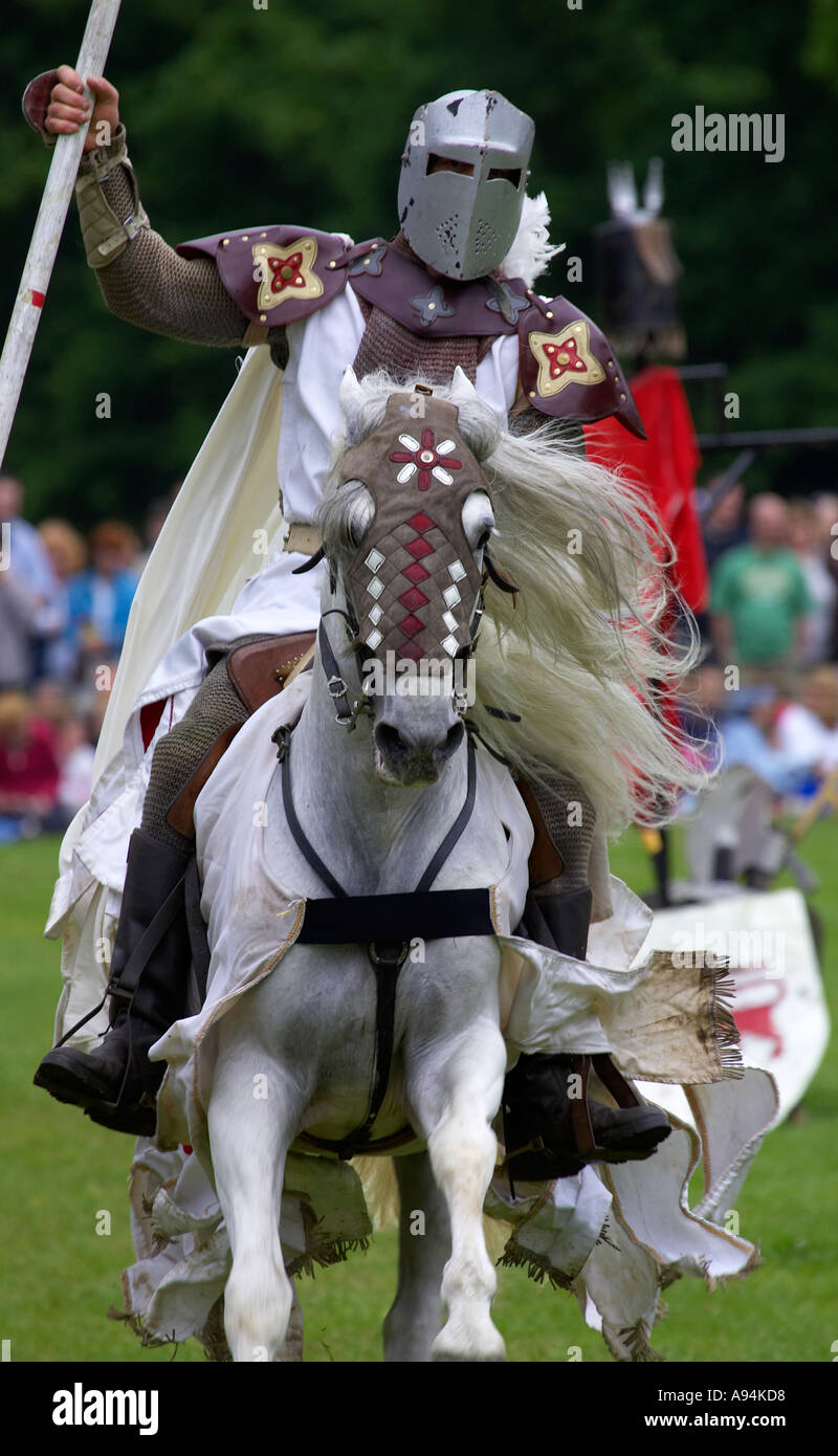 Knights jousting warwick castle England uk Stock Photo - Alamy