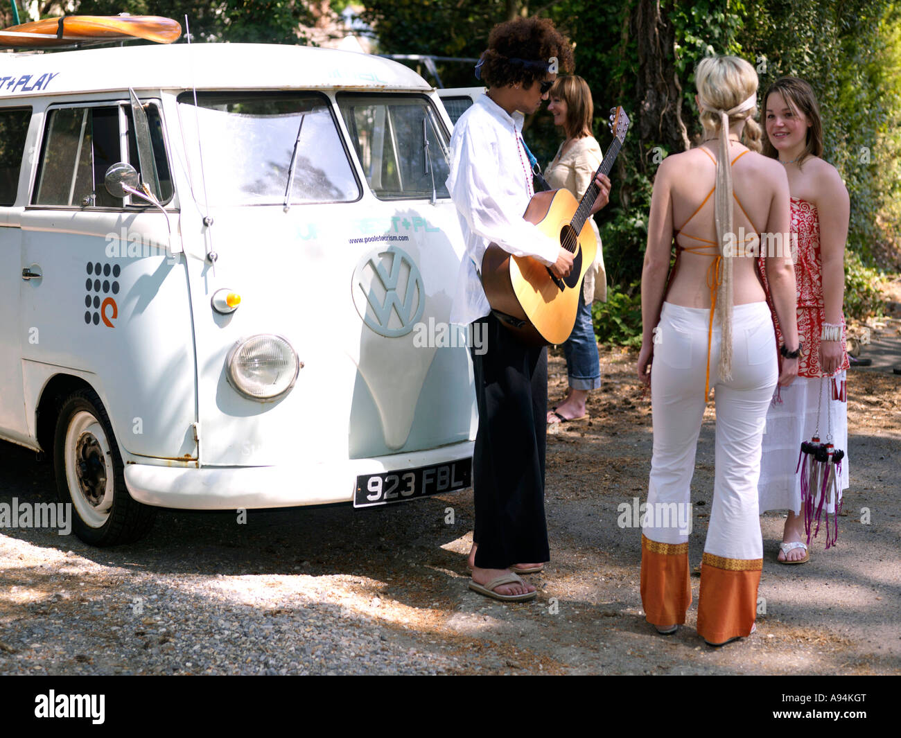 Young People In A Small Hippy Community With A Camper Van Enjoying A ...