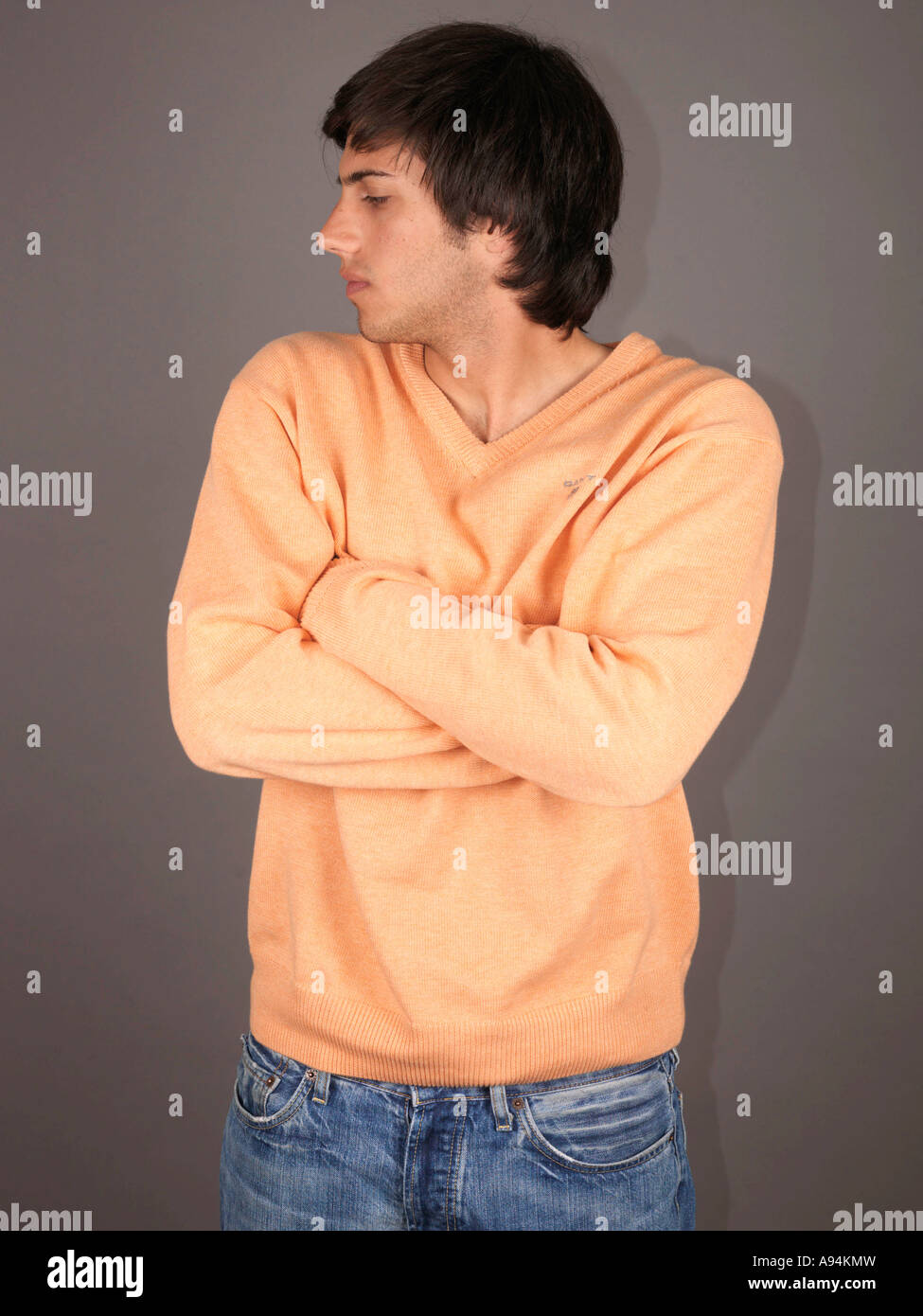 Young Man with Folded Arms Model Released Stock Photo - Alamy