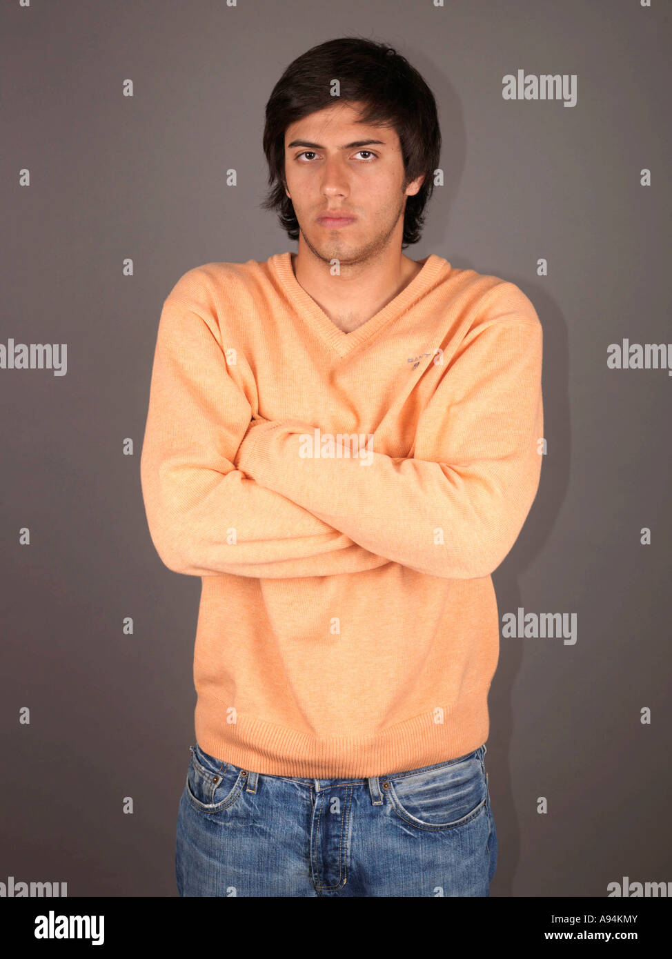 Young Man with Folded Arms Model Released Stock Photo - Alamy