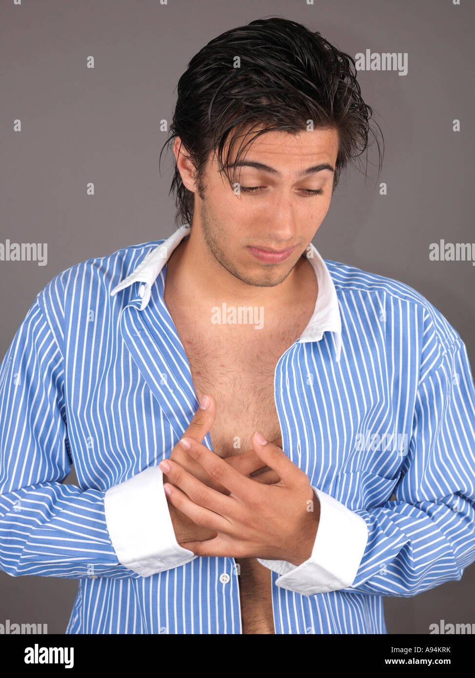 Young Man with Indigestion Model Released Stock Photo - Alamy