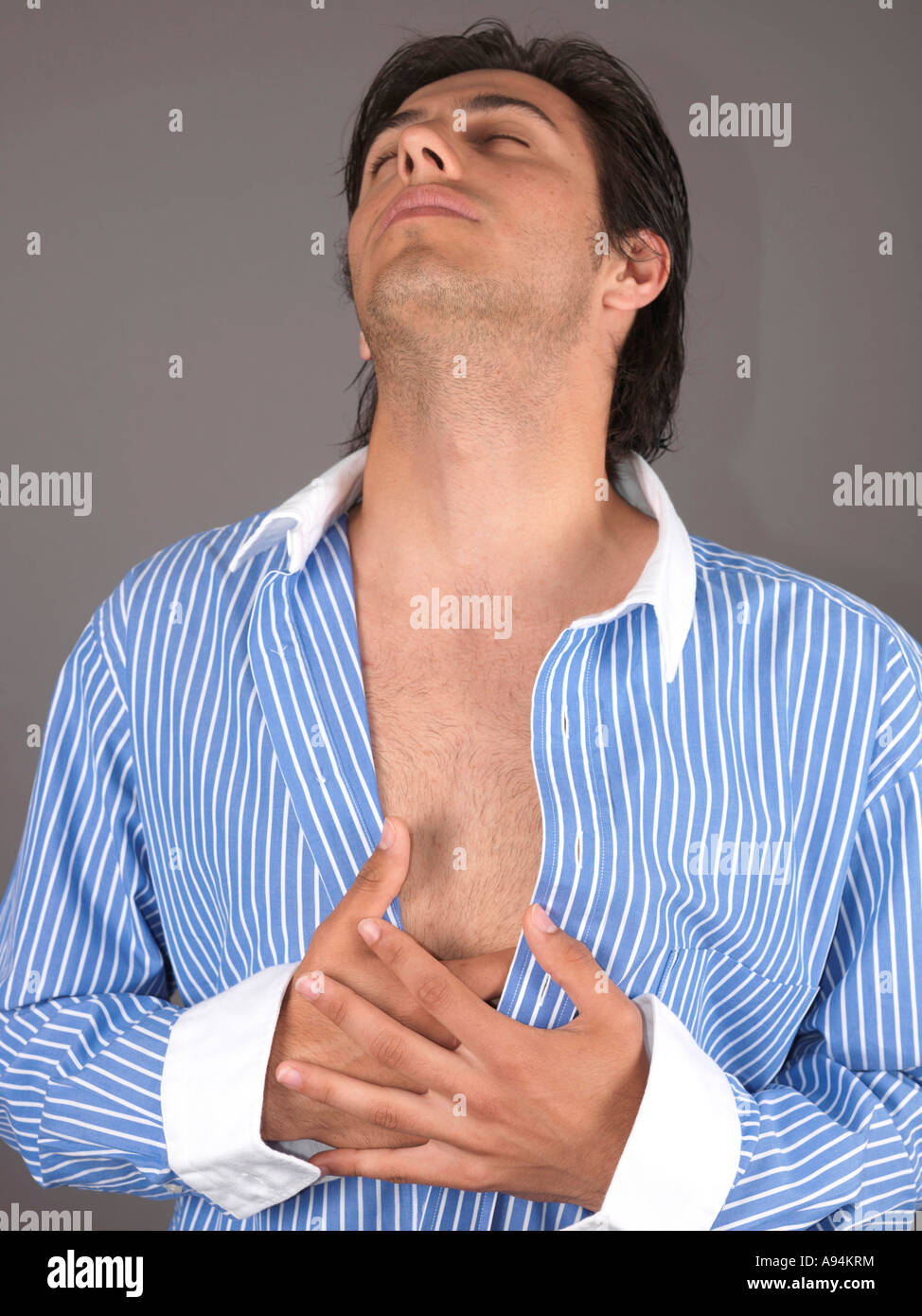 Young Man with Indigestion Model Released Stock Photo - Alamy