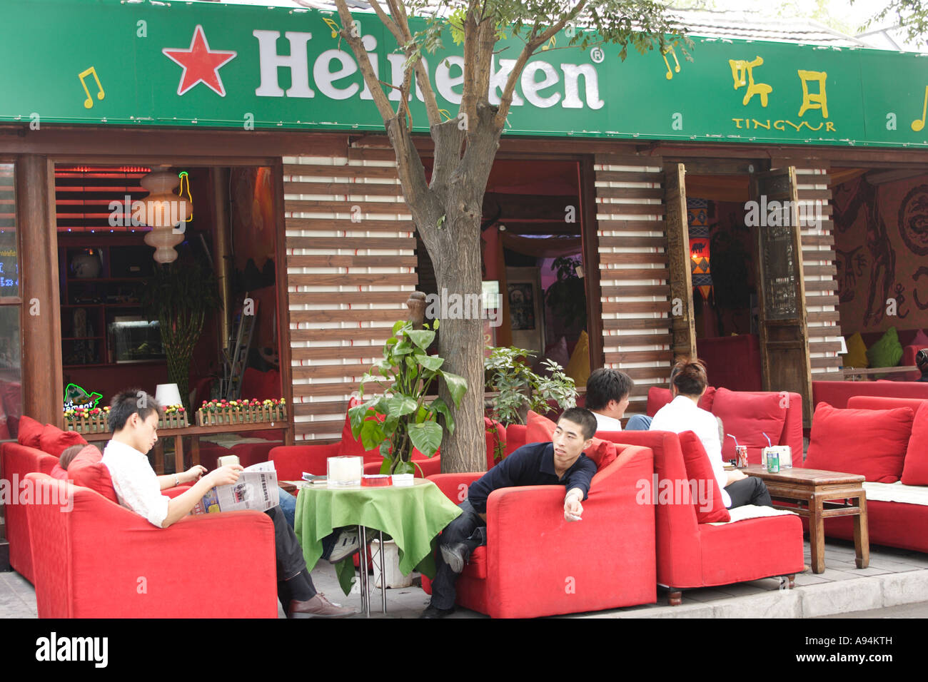 Trendy outdoor cafe bar along Houhai Lake Beijing China Stock Photo - Alamy