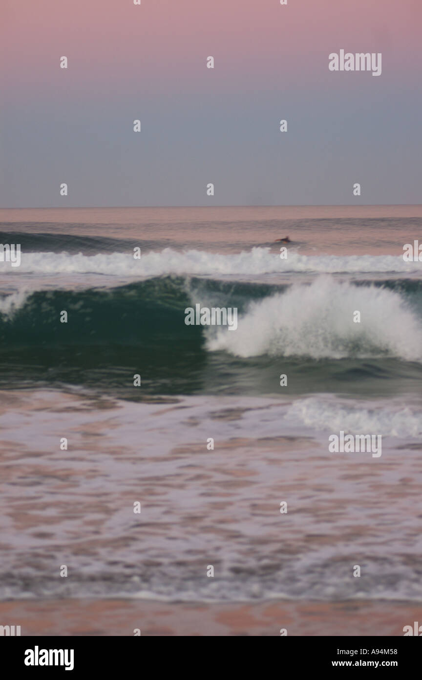 ocean wave breaking on beach Stock Photo - Alamy