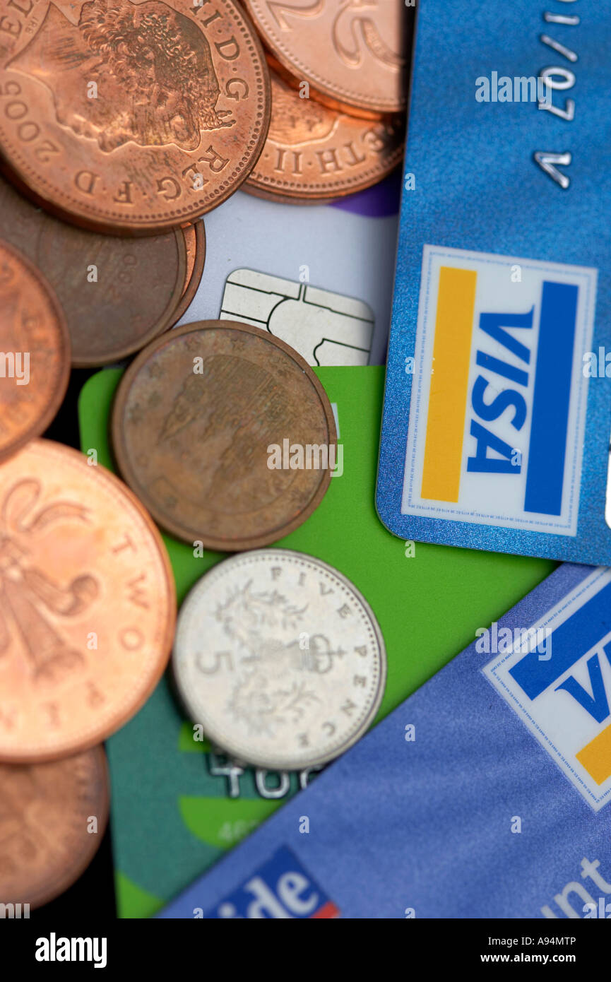 Collection of chip and pin visa credit cards with copper and silver low ...