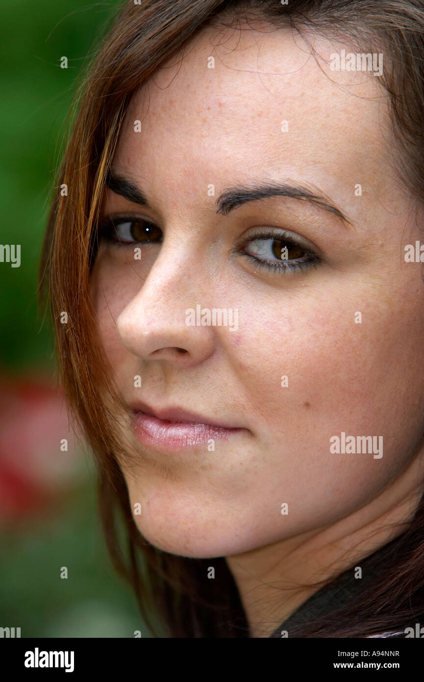 close up of face of young brown haired brown eyed irish woman early 20s ...