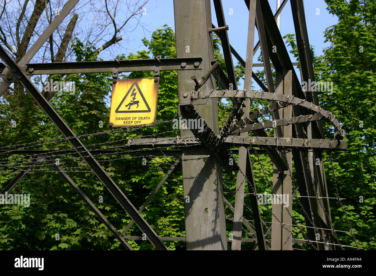 Warning sign on electricity pylon hi-res stock photography and images ...