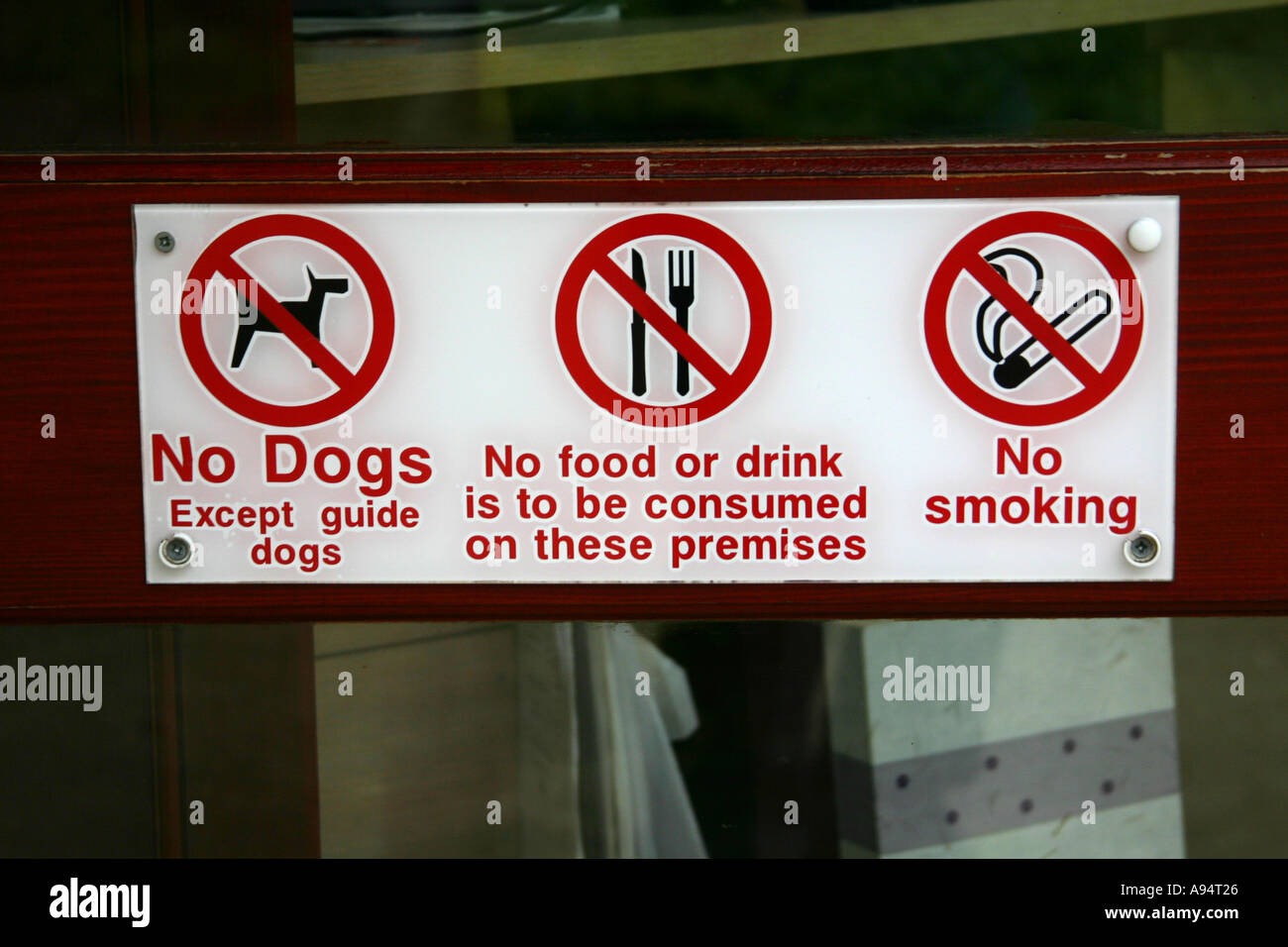 Sign banning dogs food and drink and smoking from a premises Stock ...