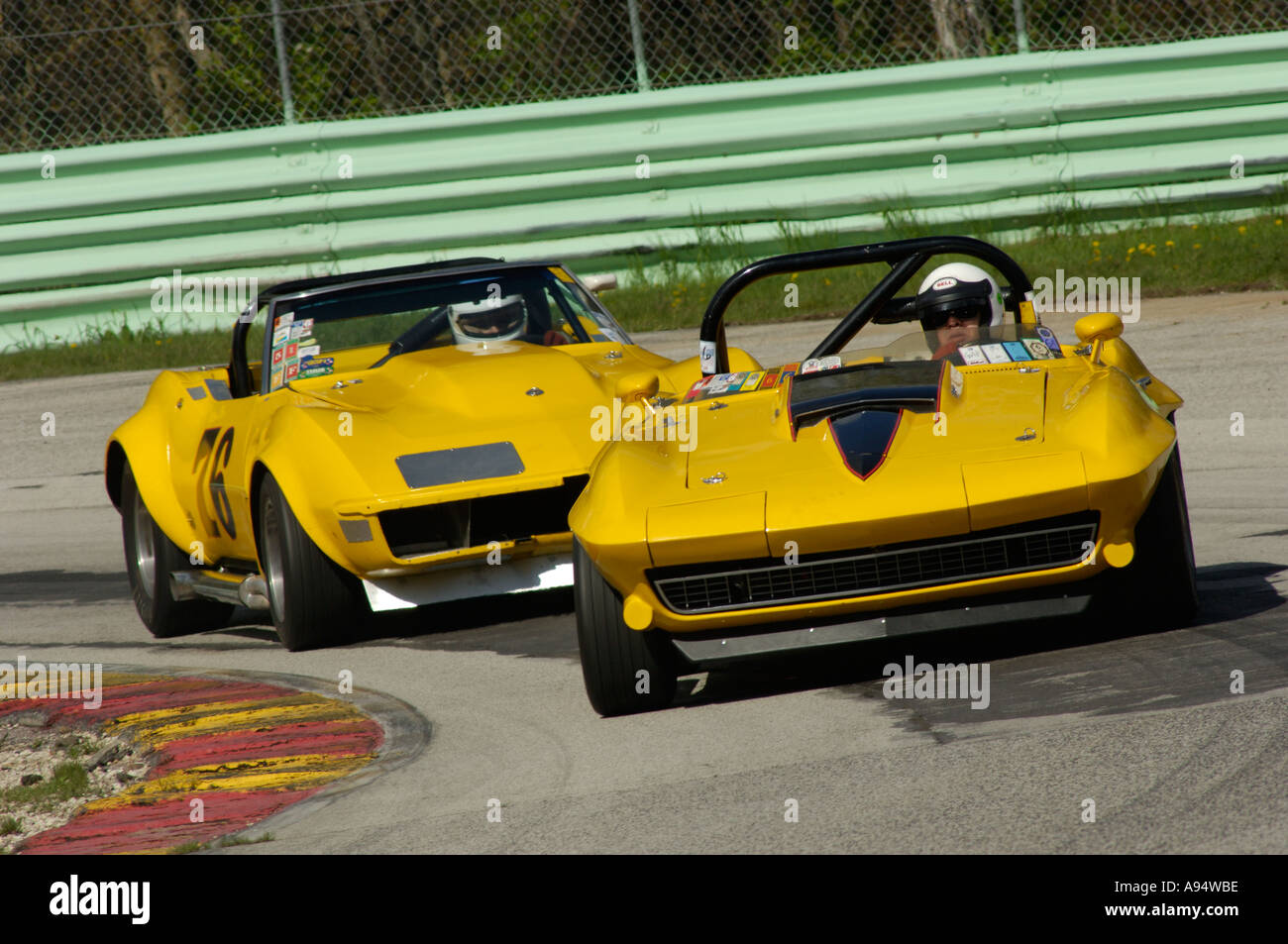 Bill Morrison in his 1965 Corvette is followed by Brian Morrison in his ...