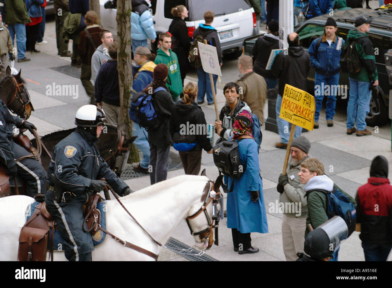 WASHINGTON Seattle Mounted police man hold peacemaker sign anti war ...