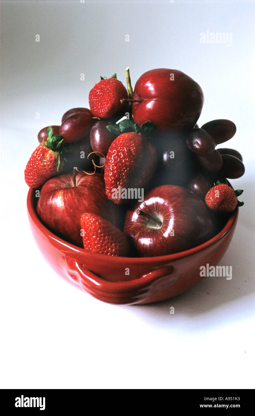 Red fruit Red bowl Stock Photo - Alamy