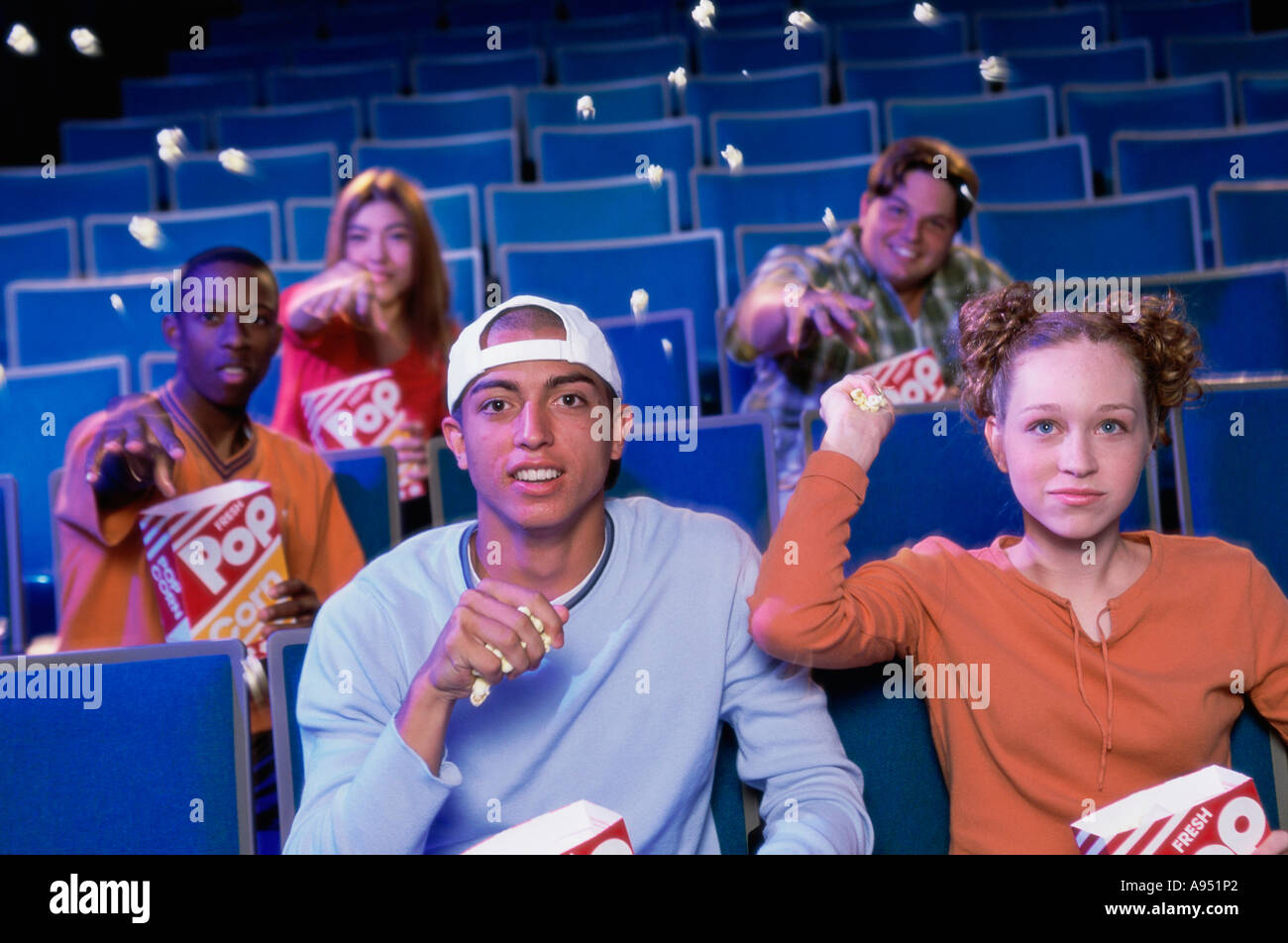 Throwing popcorn in theater hi-res stock photography and images - Alamy