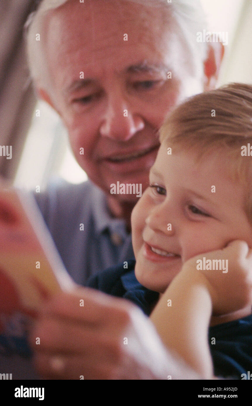 Close-up of a grandfather smiling with his grandson Stock Photo - Alamy