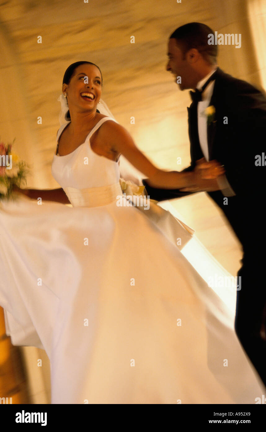 Side profile of a newlywed couple dancing Stock Photo - Alamy