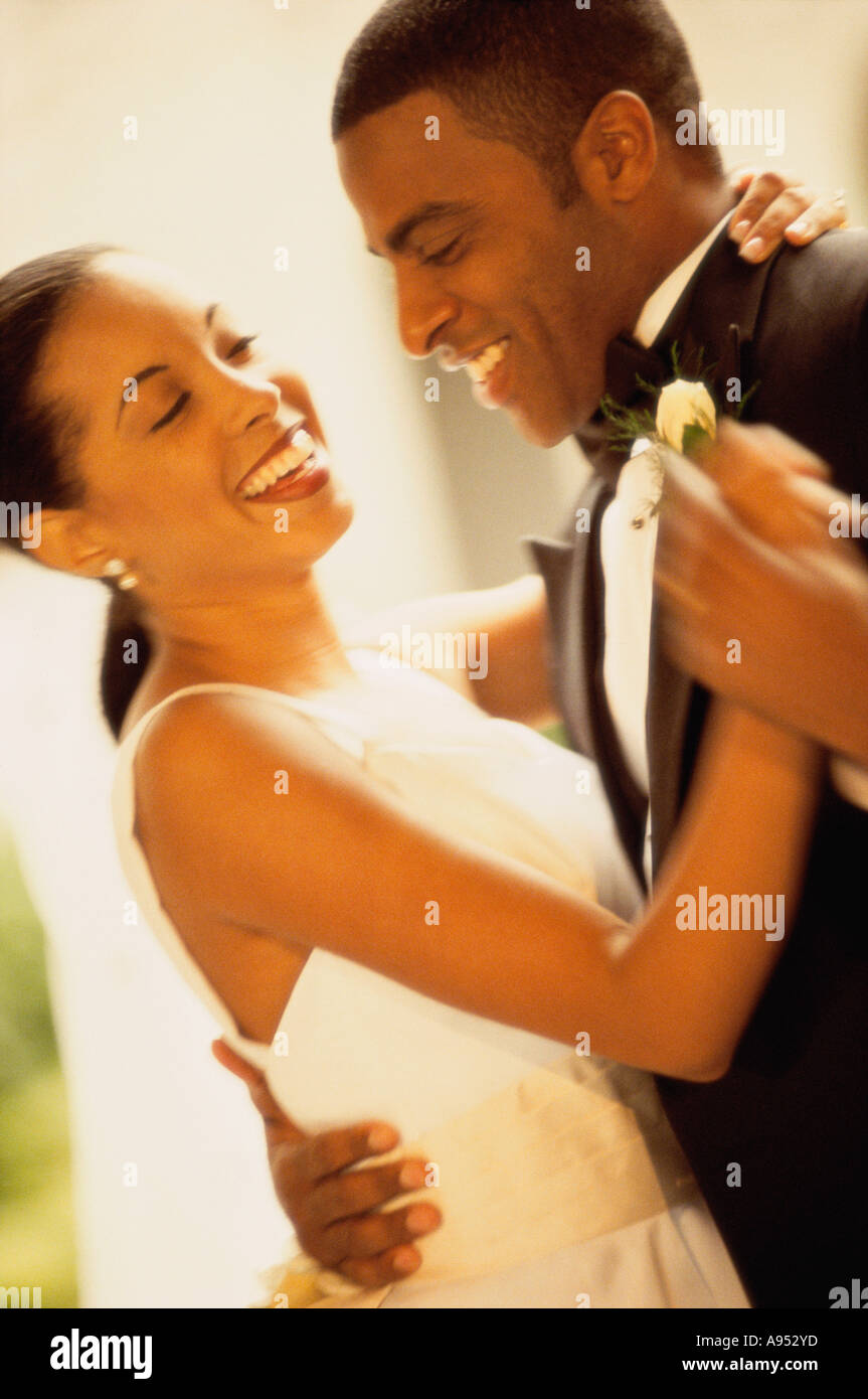 Side profile of a newlywed couple dancing Stock Photo - Alamy