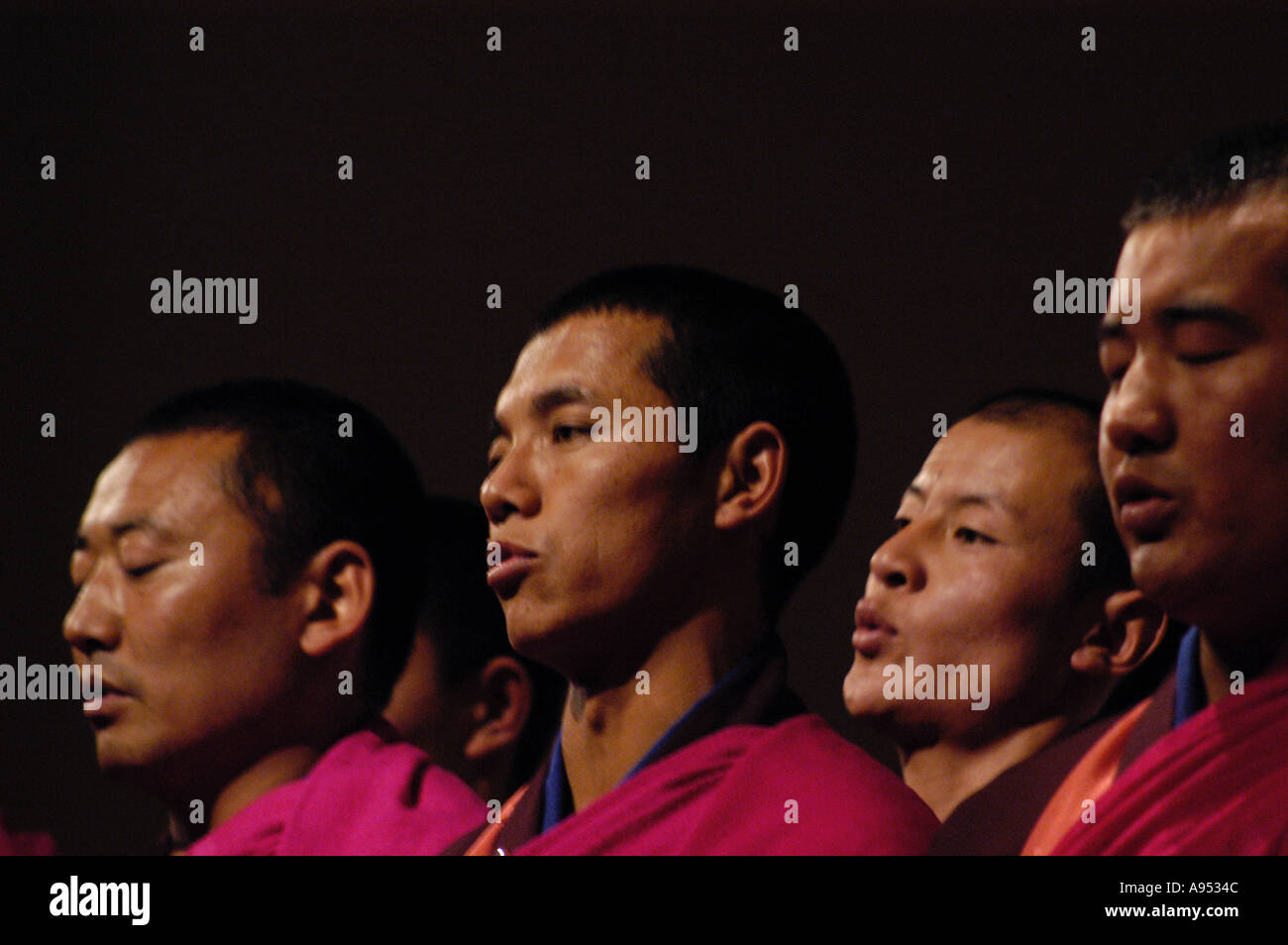 Tibetan monks performing sacred music Stock Photo - Alamy