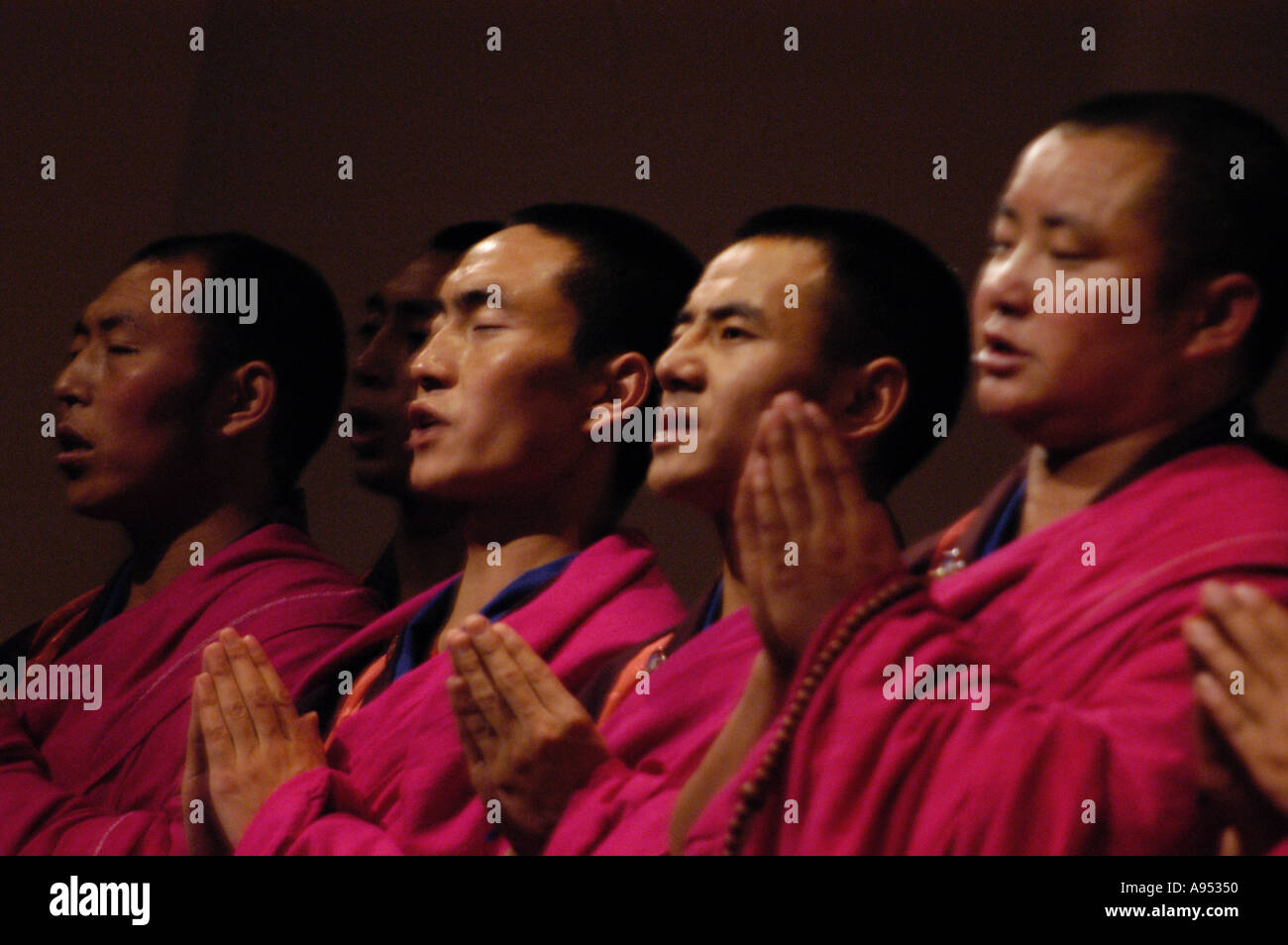 Tibetan monks performing sacred music Stock Photo - Alamy