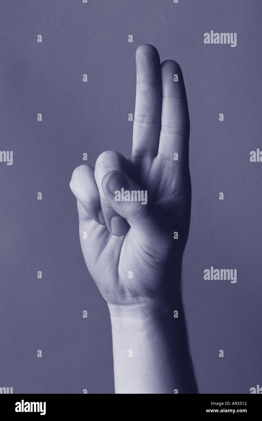 Hand showing two fingers Stock Photo - Alamy