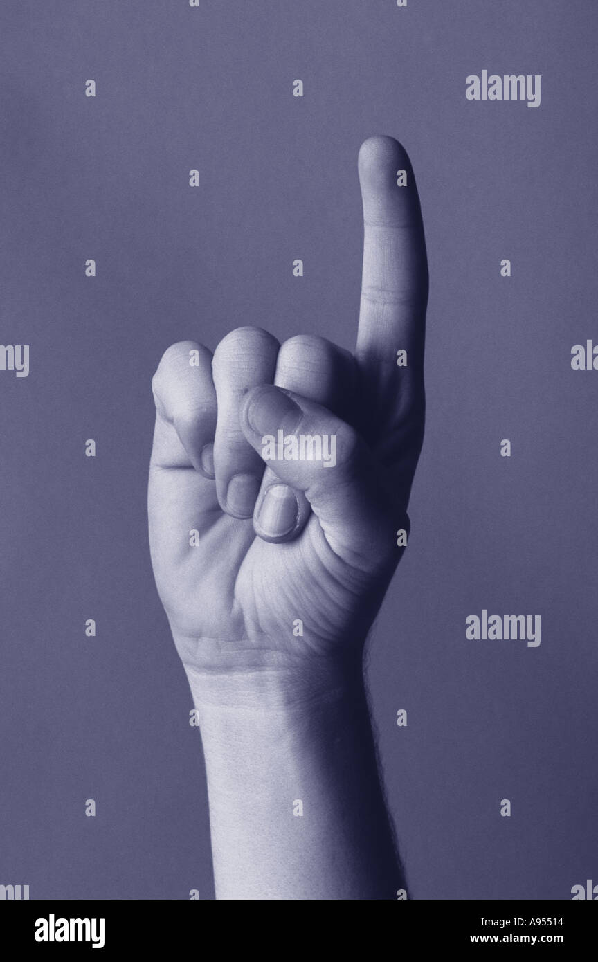 Hand showing one finger Stock Photo - Alamy