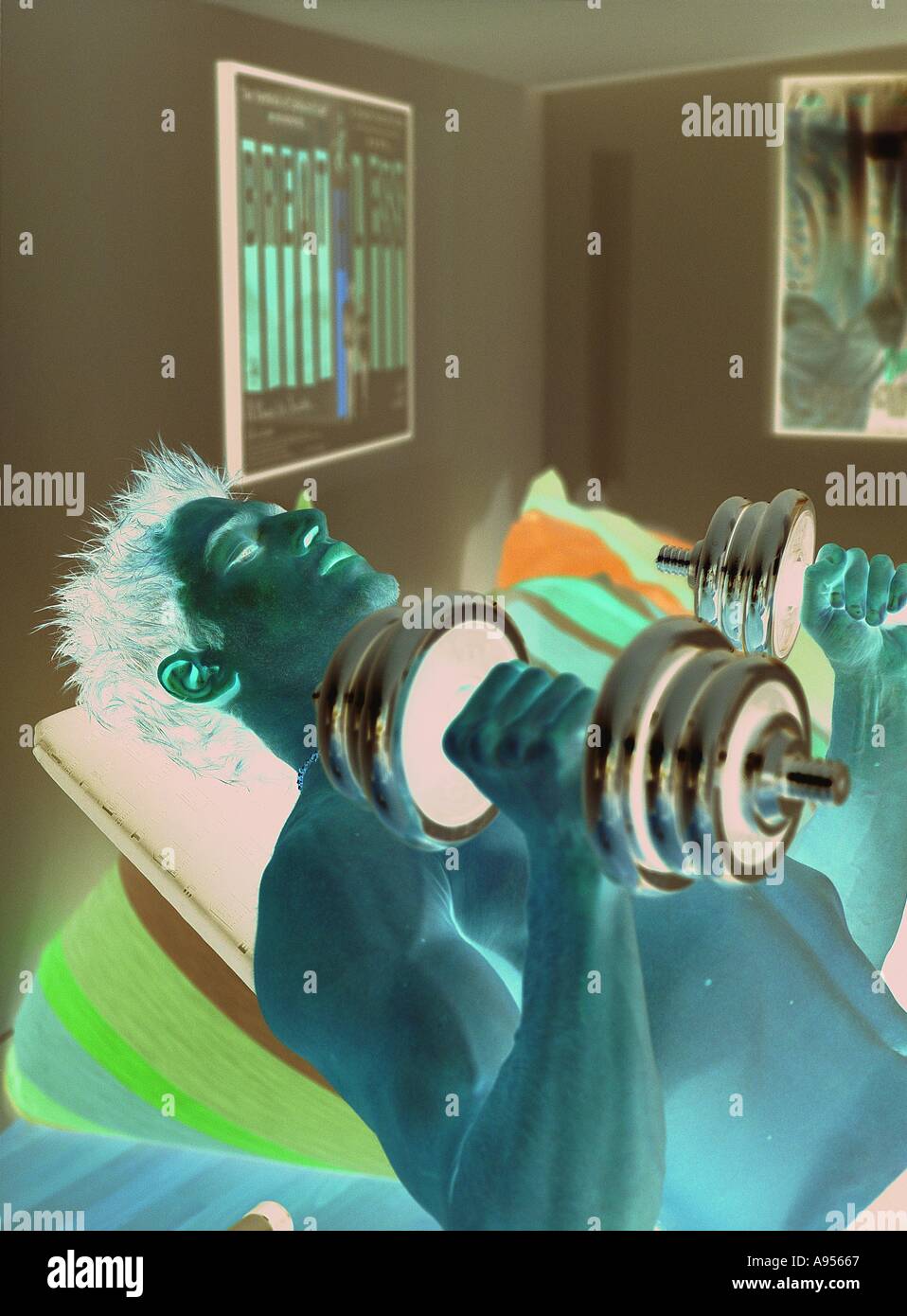 Photograph of man using weights Stock Photo - Alamy
