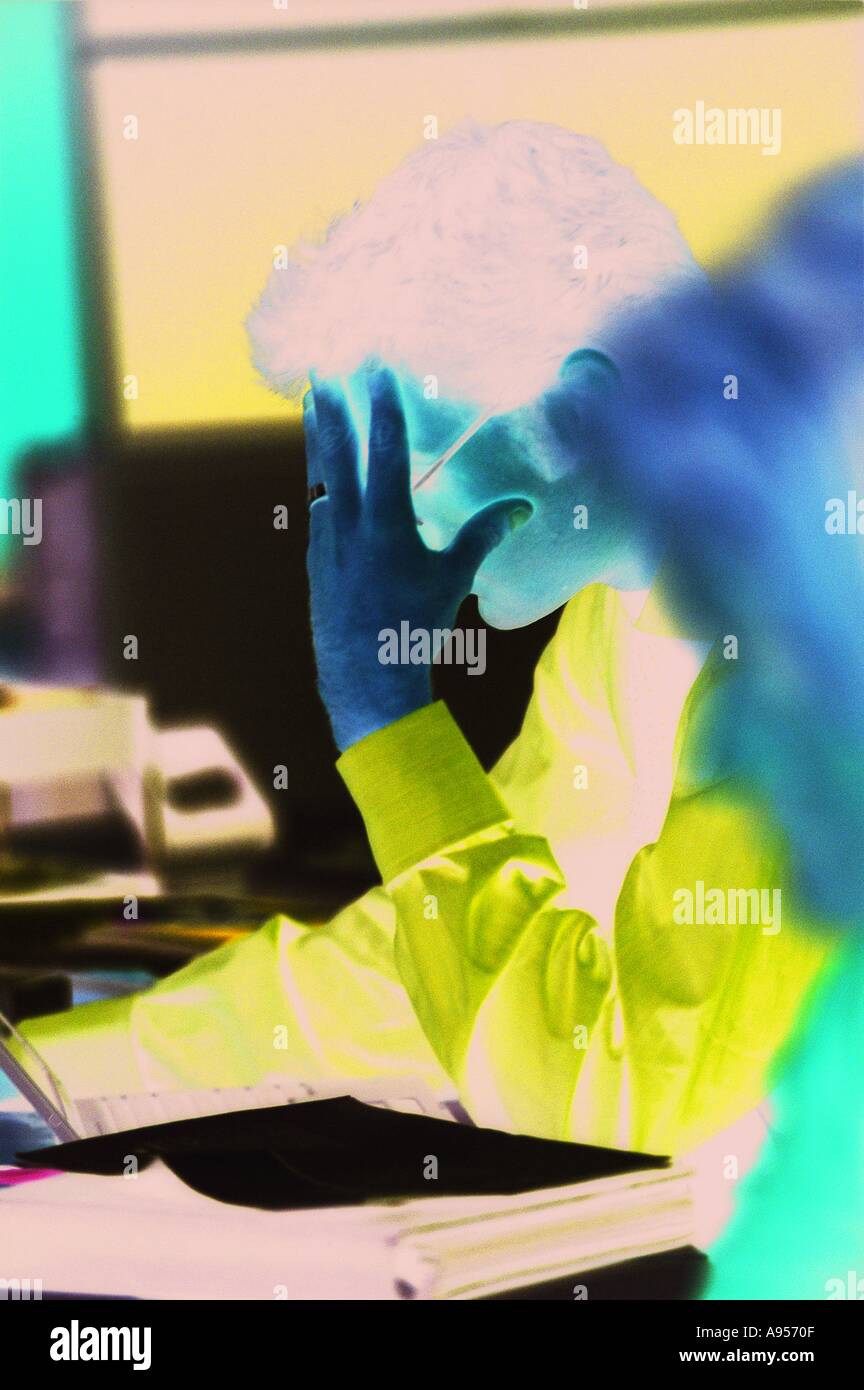 Photograph of man concentrating on work Stock Photo - Alamy