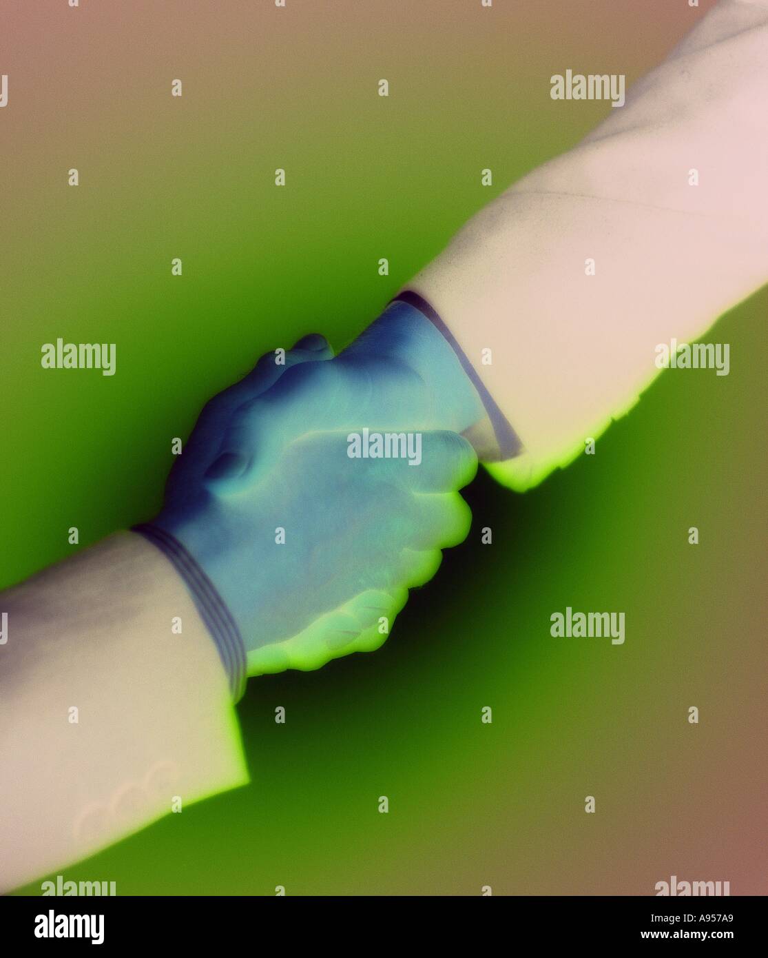 Photograph of mens arms making handshake Stock Photo - Alamy